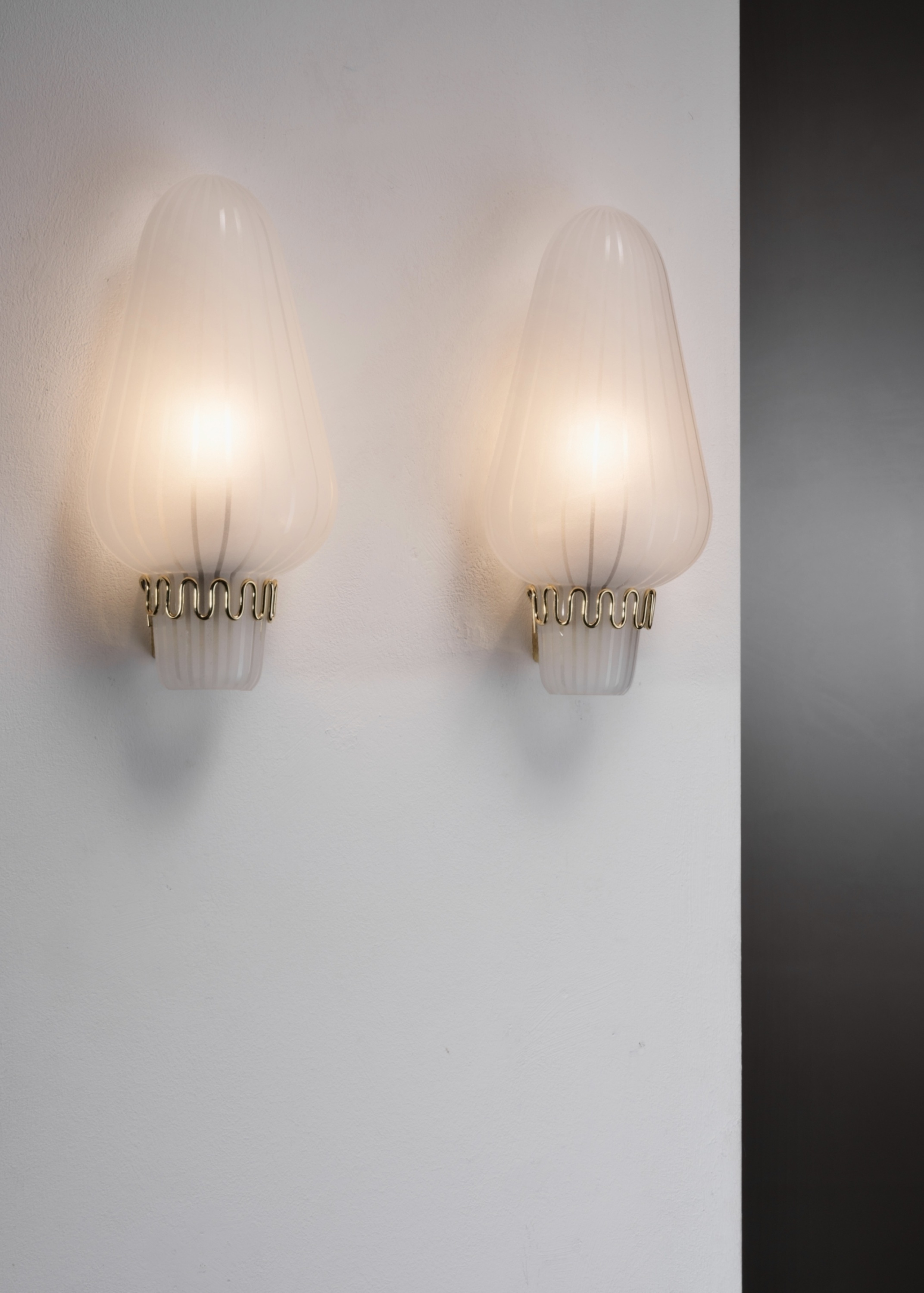 Pair of Harald Notini wall lamps for Böhlmarks | Bloomberry