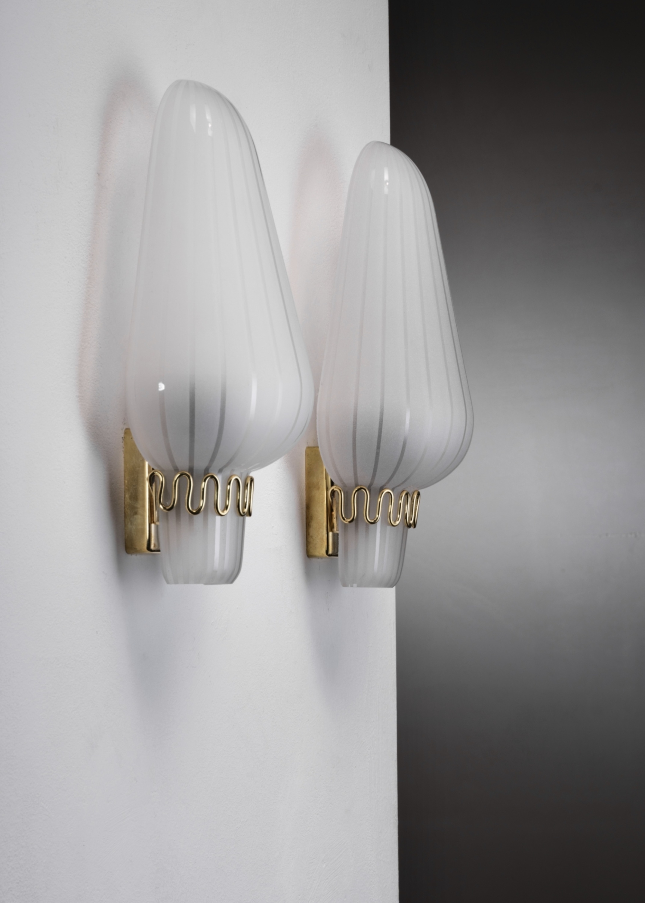 Pair of Harald Notini wall lamps for Böhlmarks | Bloomberry